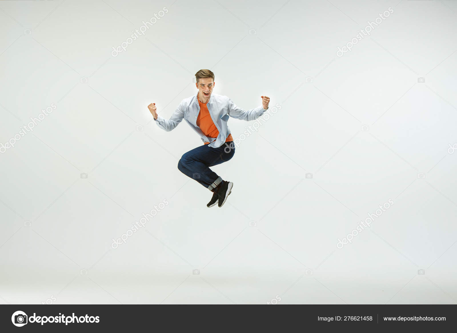 Office worker jumping isolated on white studio background — Stock Photo ...