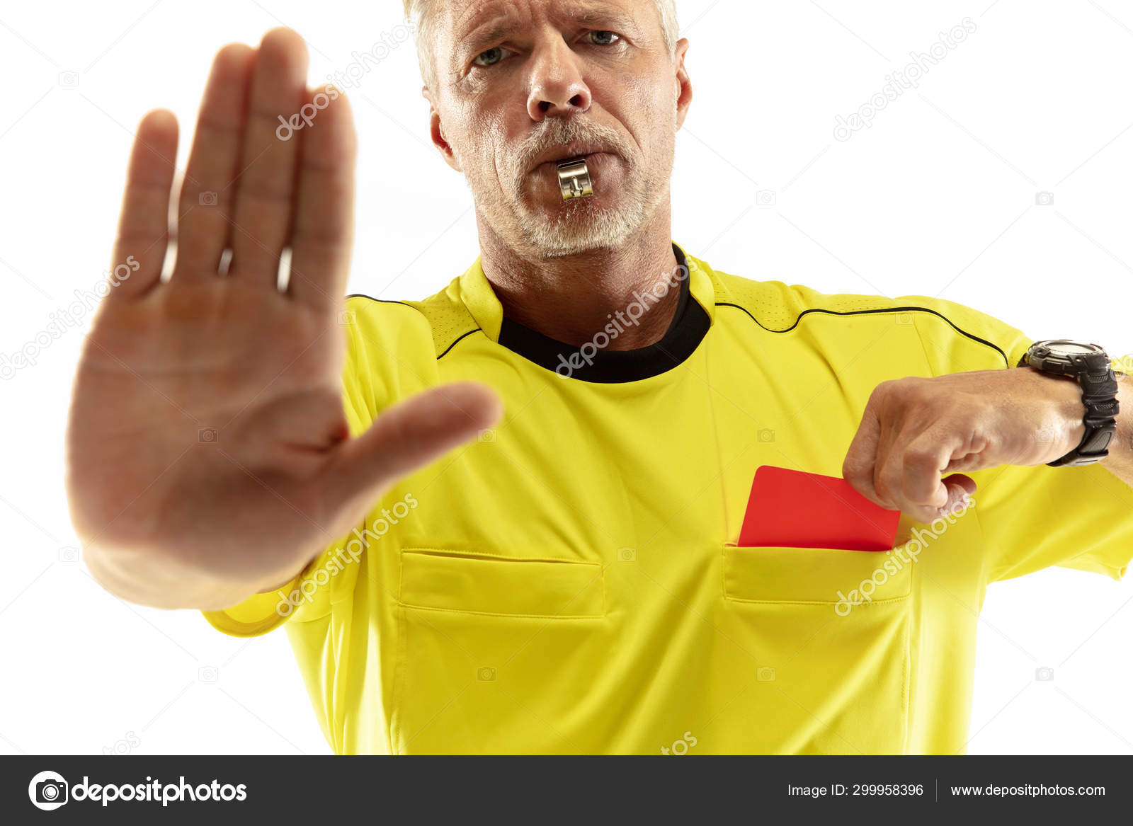 Football referee showing a red card to a displeased player isolated on ...