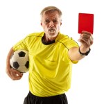 Football referee showing a red card to a displeased player isolated on ...