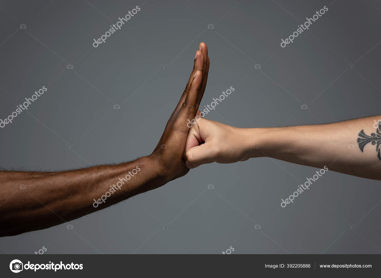 Racial tolerance. Respect social unity. African and caucasian hands ...