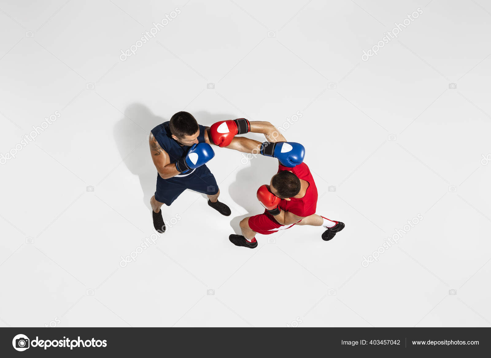 Two professional boxers boxing isolated on white studio background ...