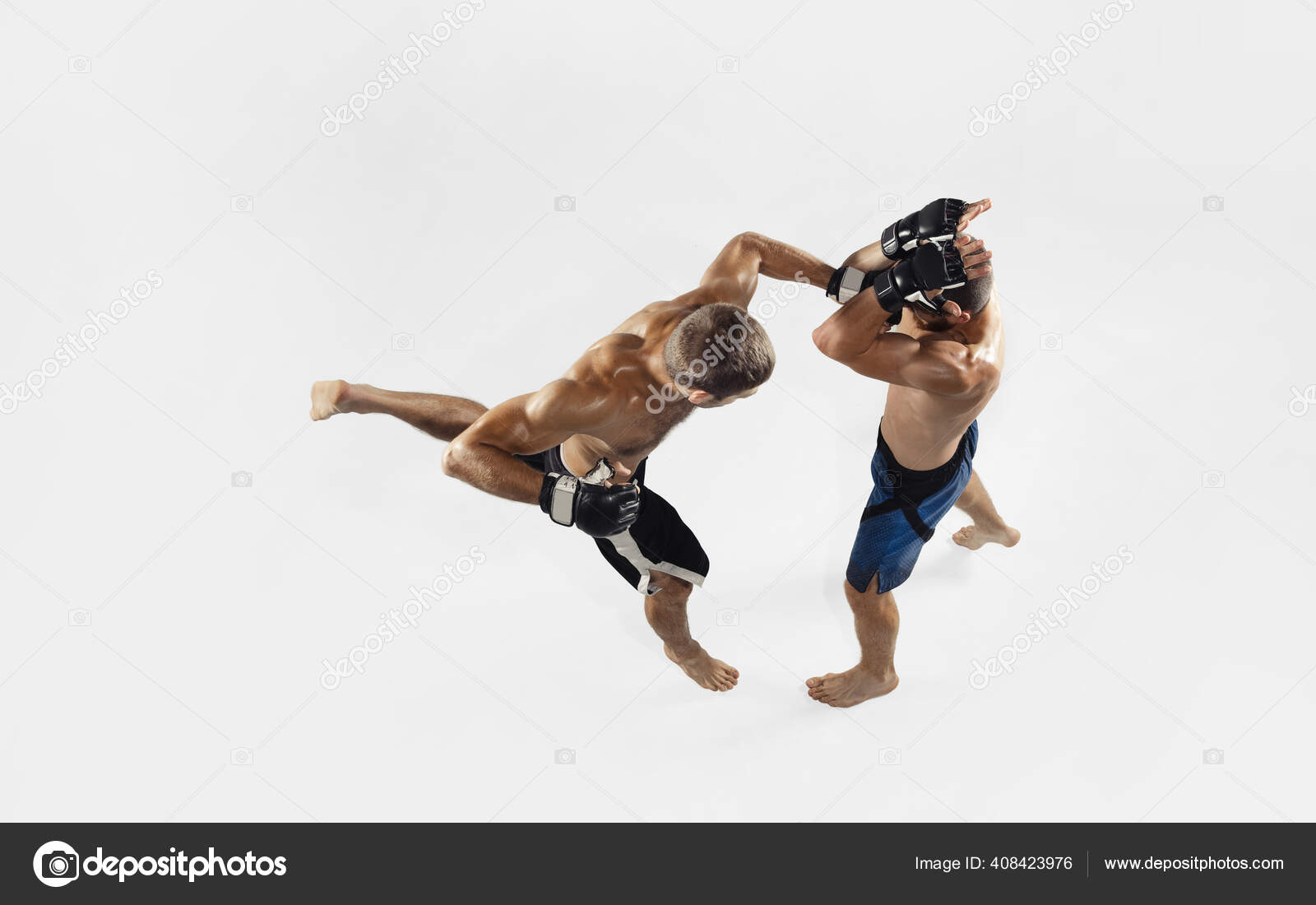 Two professional MMA fighters boxing isolated on white studio ...
