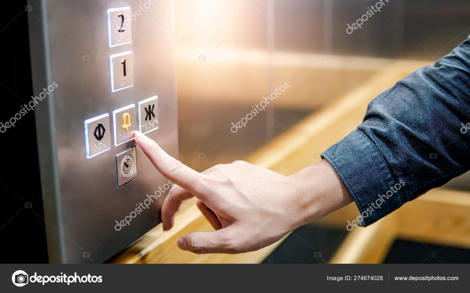 Male hand pressing on emergency button in elevator Stock Photo by ...