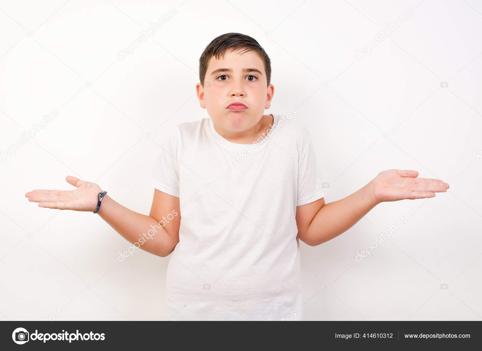 Puzzled Clueless Young Boy Arms Out Shrugging His Shoulders Saying ...