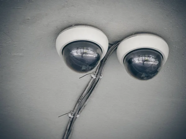 Double CCTV camera security on old concrete ceiling, With place your ...