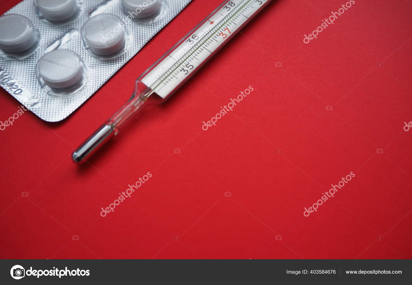 Blister packing tablets with a thermometer — Stock Photo © olga5226 ...