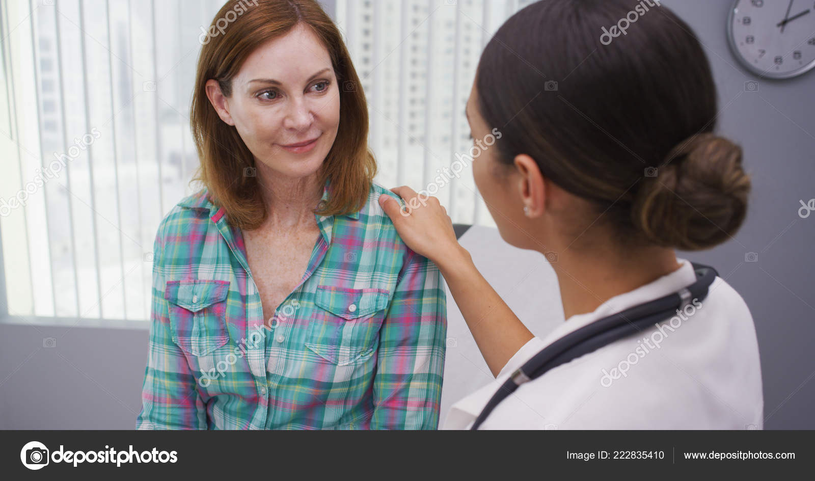 Charming Mid Aged Patient Receiving Good News Young Latina Doctor Stock ...
