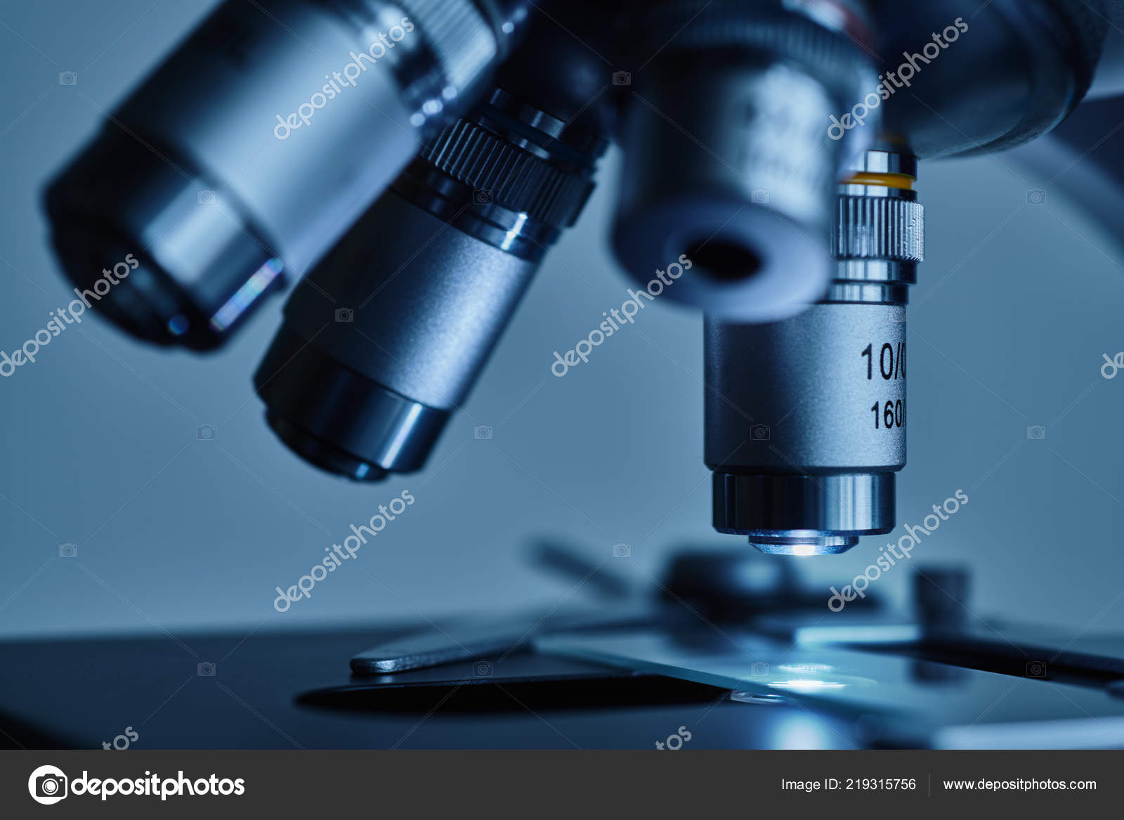 Modern microscope with metal lens at laboratory. — Stock Photo ...