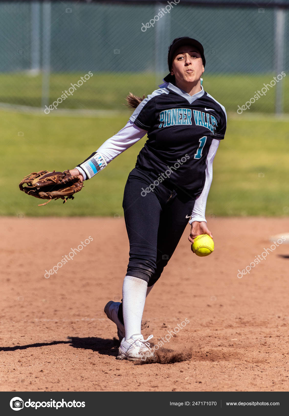 Softball Player Black Uniform Releasing Pitch Left Hand Delivery Game ...