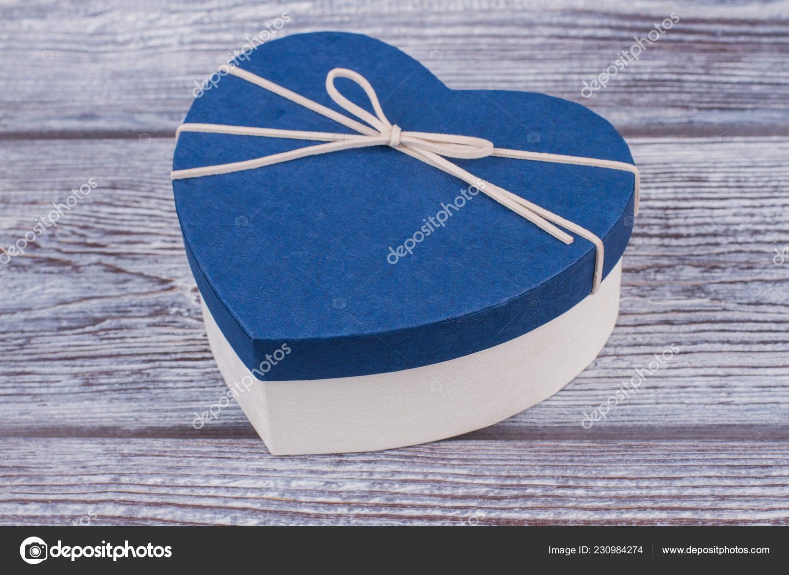 Blue heart-shaped gift box. Stock Photo by ©Denisfilm 230984274