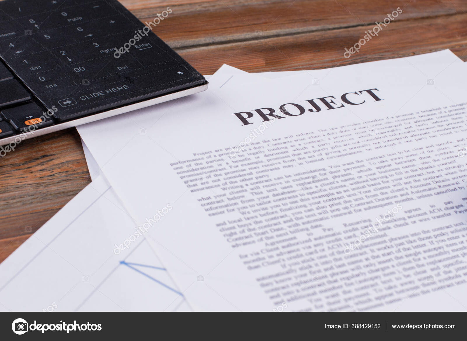 Close-up paper with project and keyboard on the wooden desk. — Stock ...