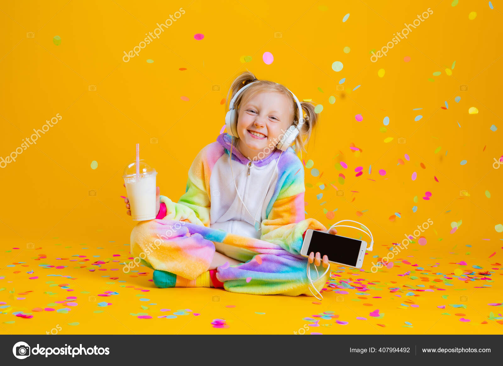 Happy Little Girl Unicorn Kigurumi Listens Music Headphones Smartphone ... Happy Little Girl Unicorn Kigurumi Listens Music Headphones Smartphone ...