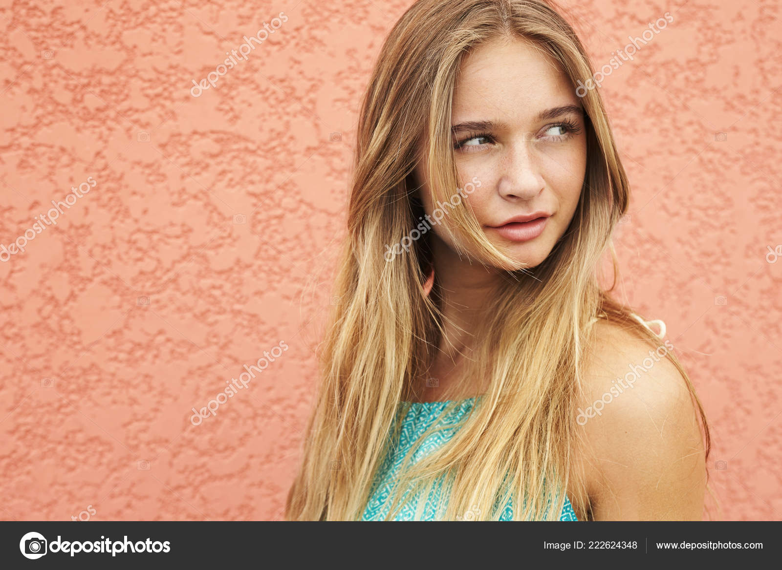Beautiful Blond Woman Looking Shoulder Stock Photo by ©sanneberg 222624348