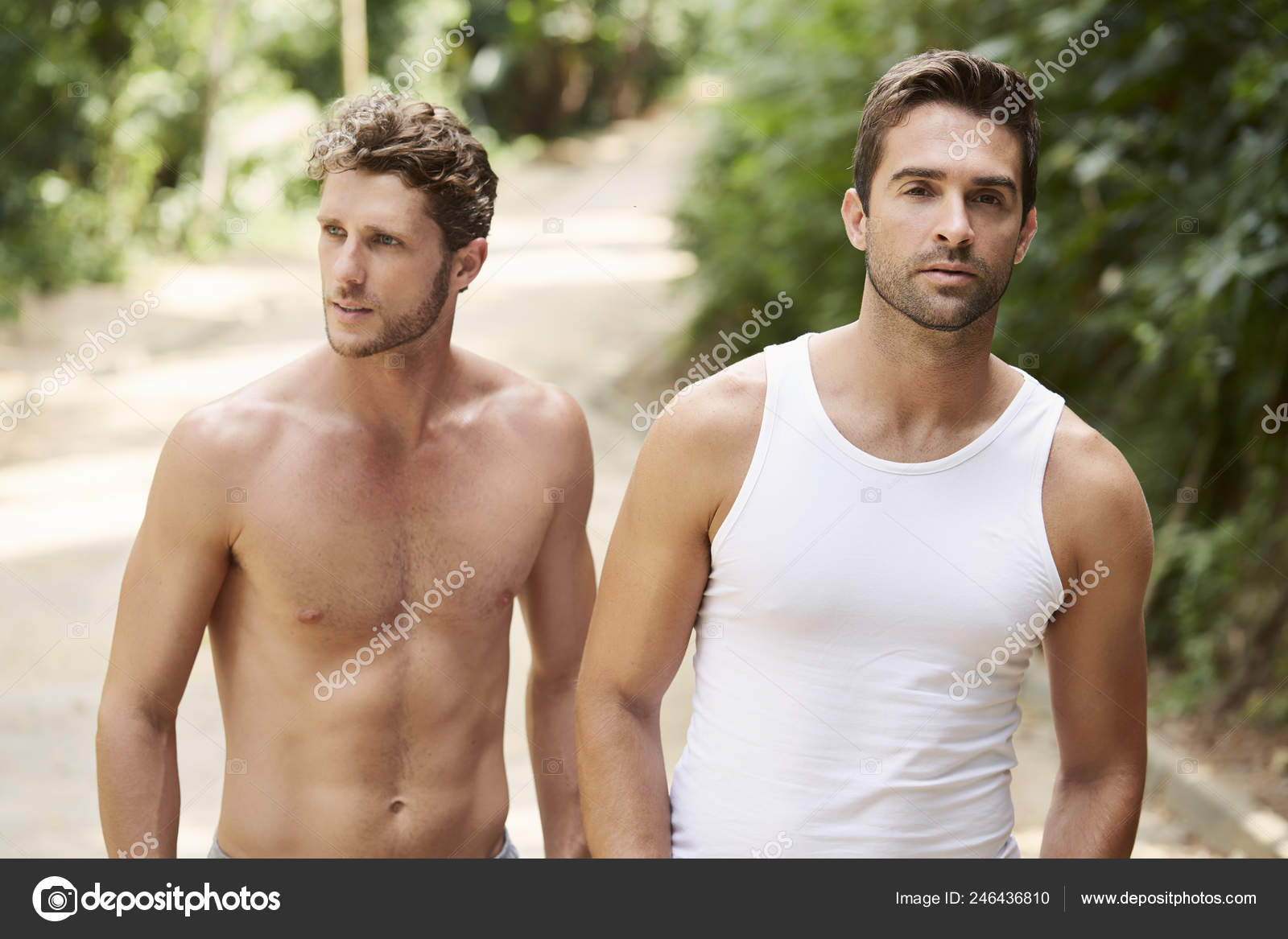 Two Seriously Handsome Dudes Looking Away — Stock Photo © sanneberg ...