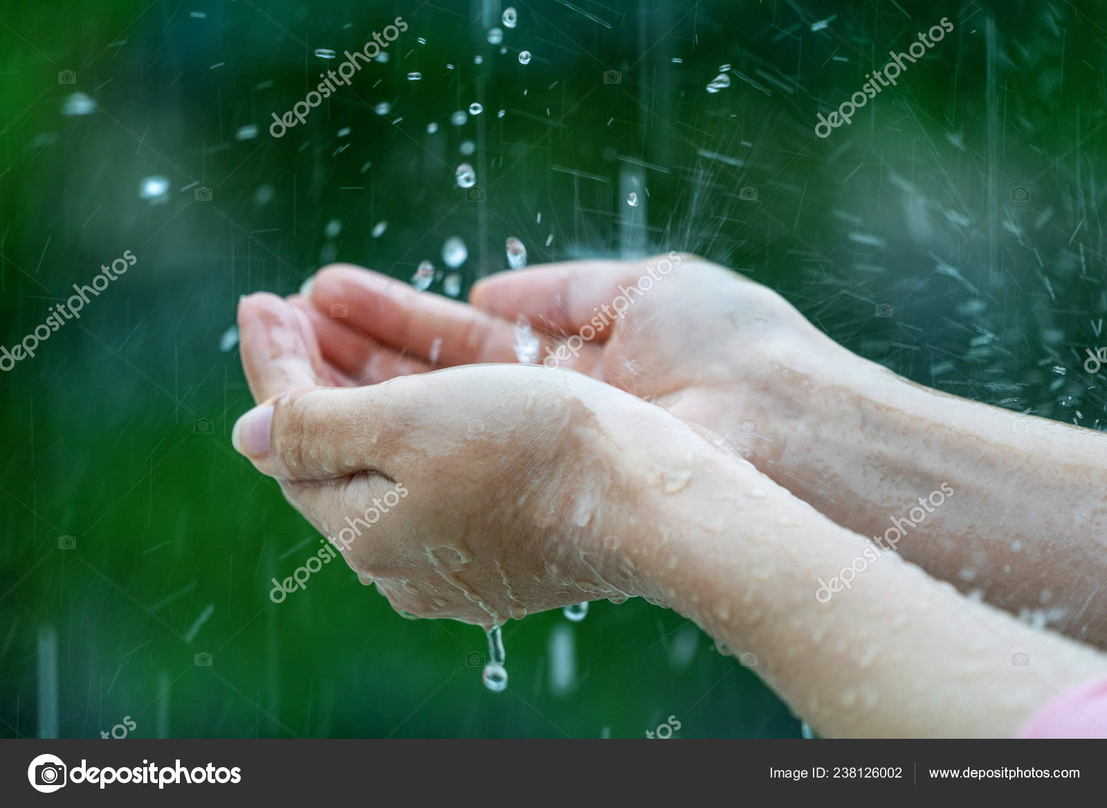 Couple Holding Hands In Rain