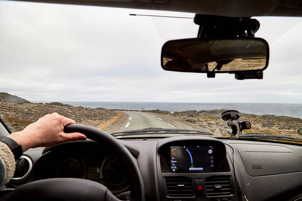 View from car window on the road and pity strange landscape with a ...