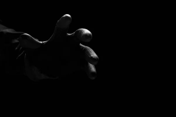 Hand Reaching Down Into Darkness