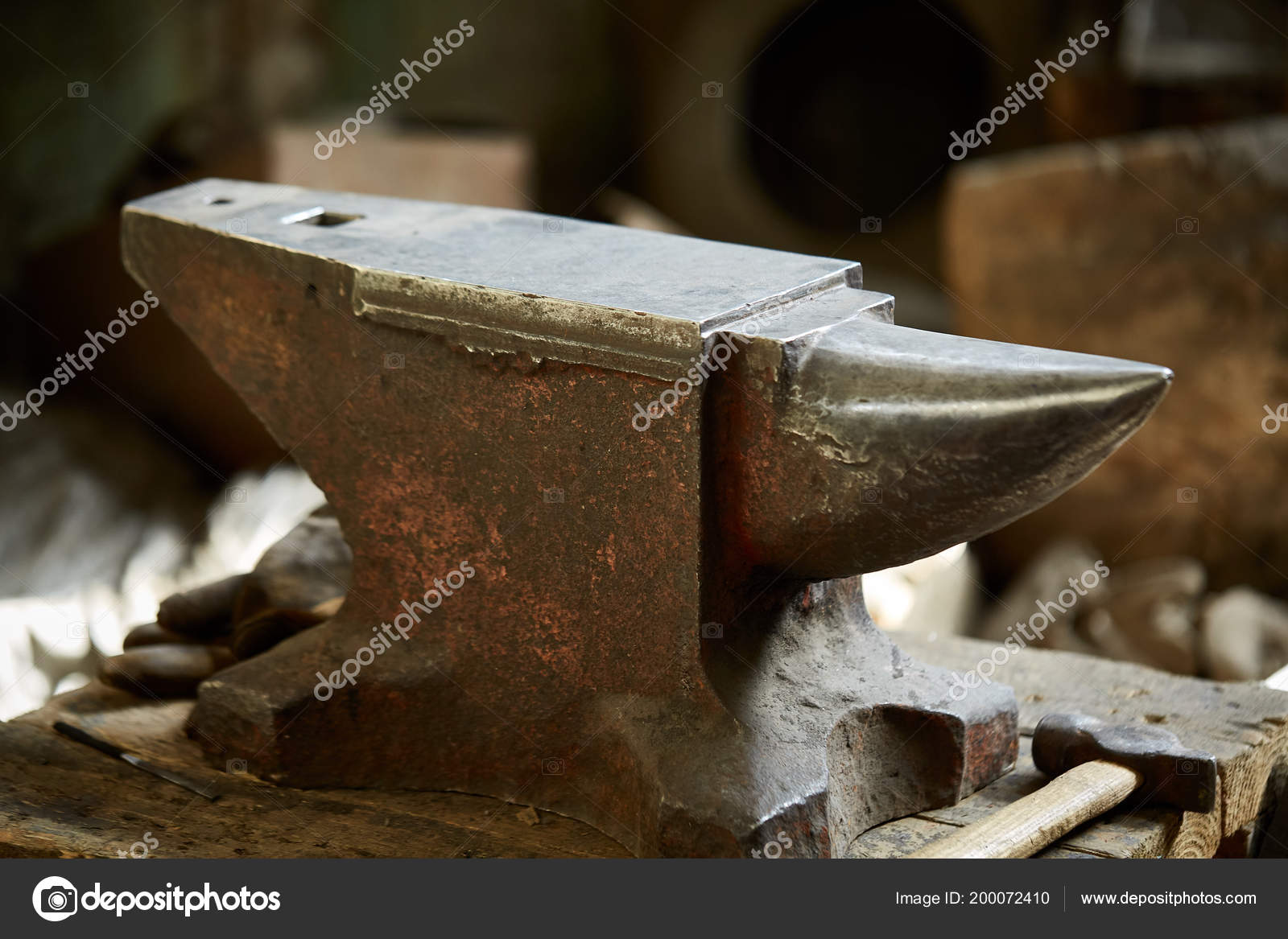 Big heavy anvil in the blacksmiths workshop, close-up, selective focus ...