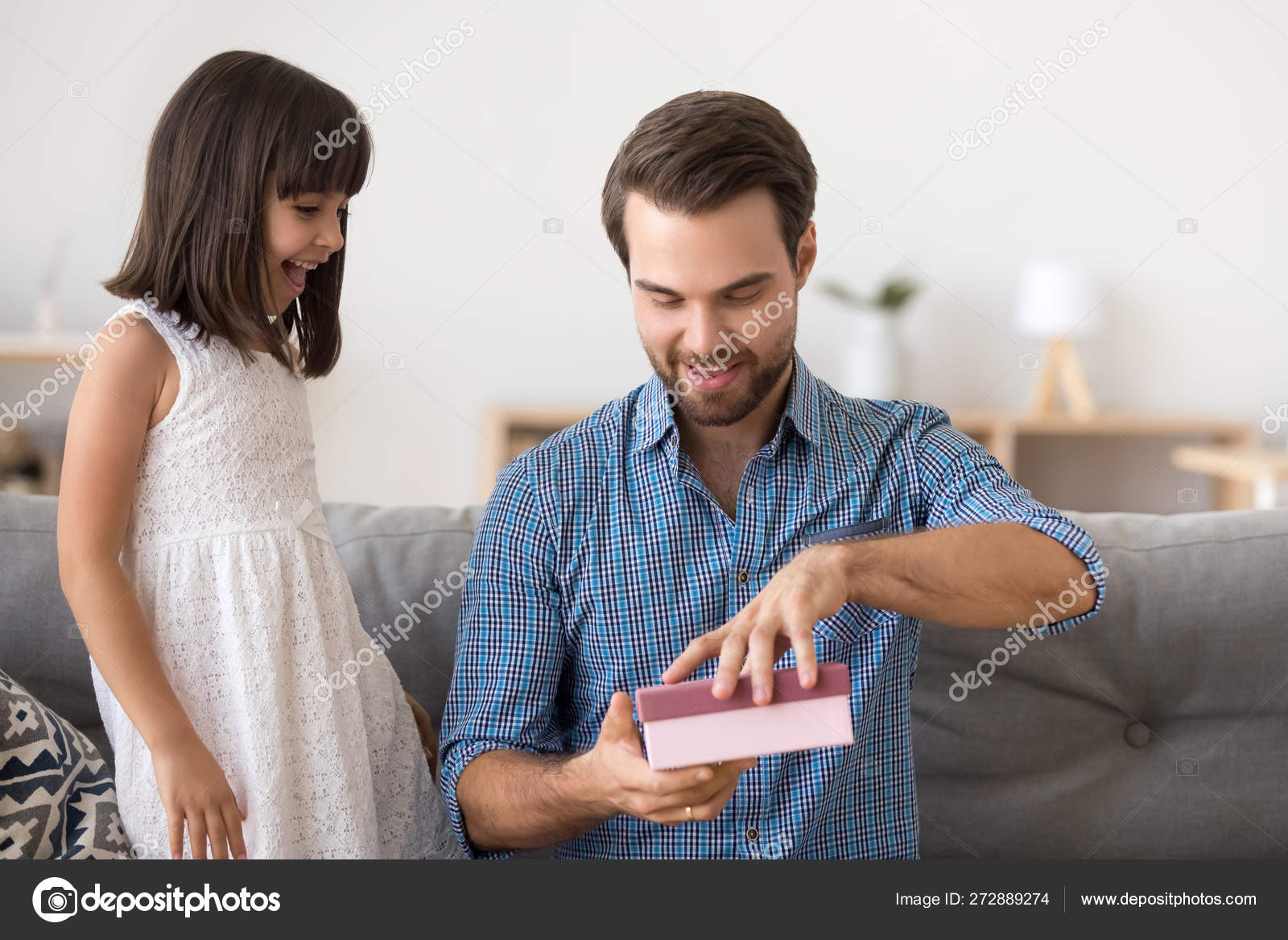 Excited dad open gift box from cute preschooler daughter — Stock Photo ...