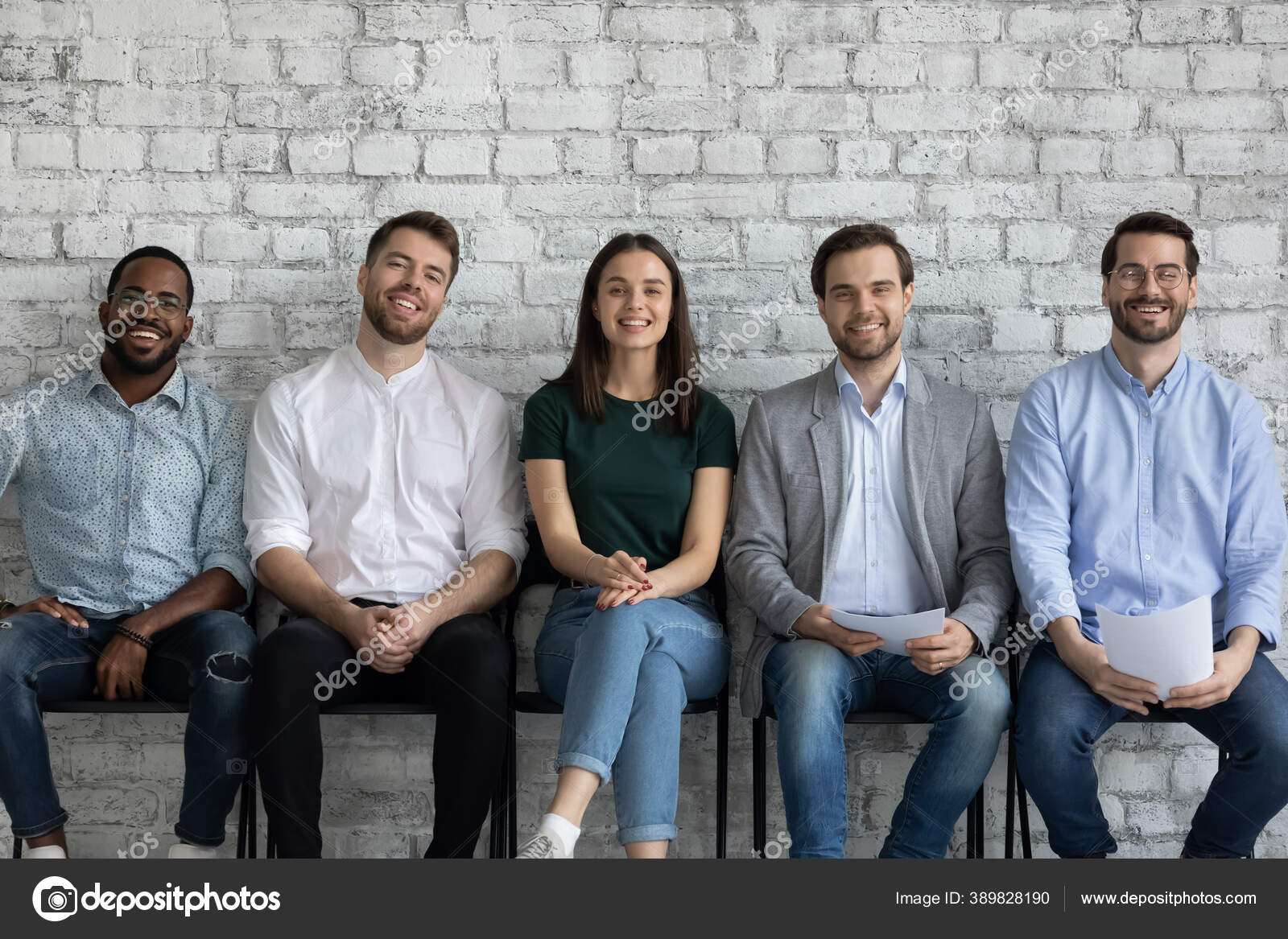 Five multiethnic applicants wait job interview smiling looking at ... Five multiethnic applicants wait job interview smiling looking at ...