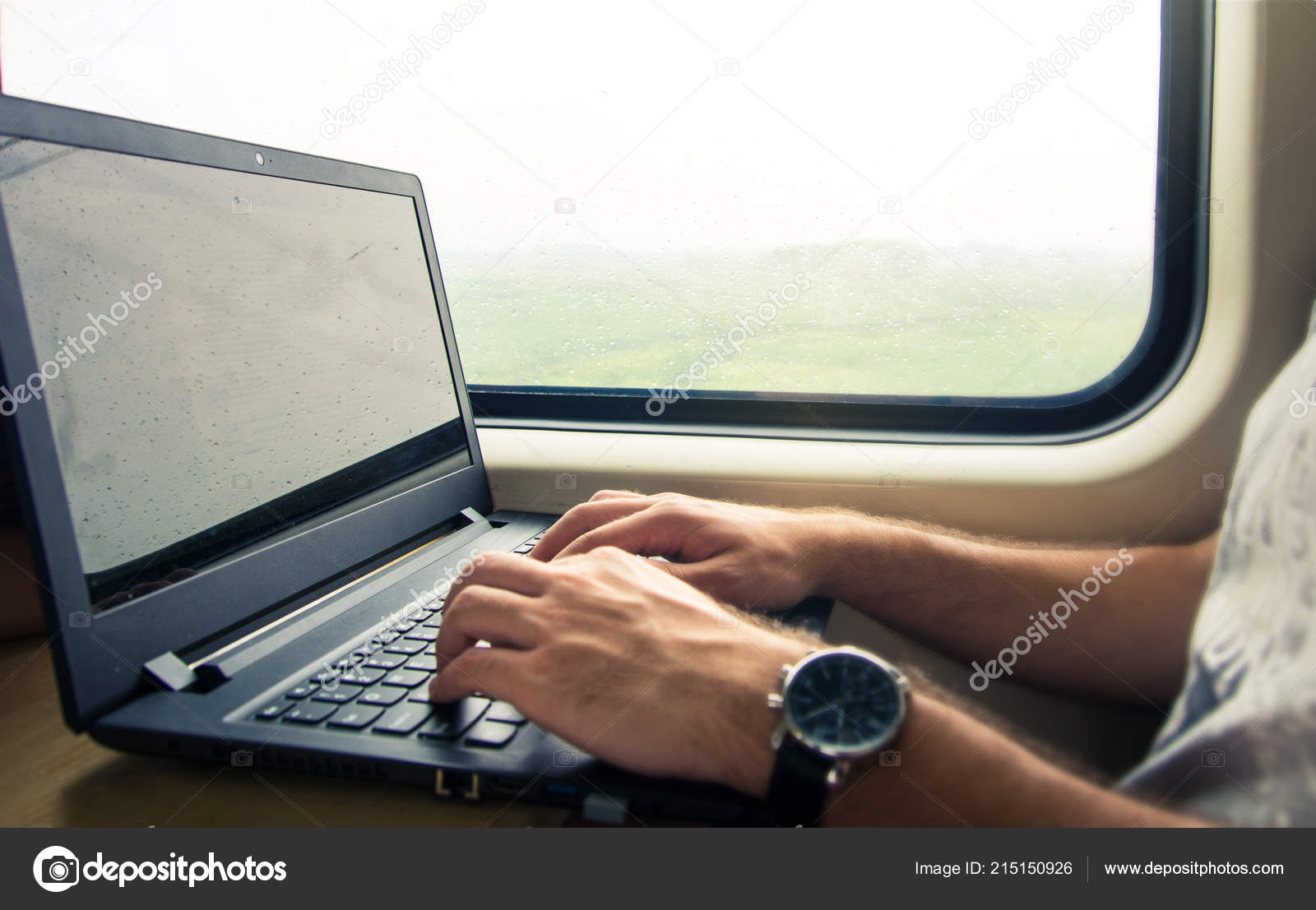 Man Working Laptop Computer Train — Stock Photo © CreativeFamily #215150926