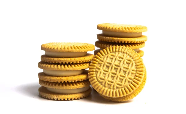 Golden biscuits isolated on white Stock Photo by ©CreativeFamily 291463422