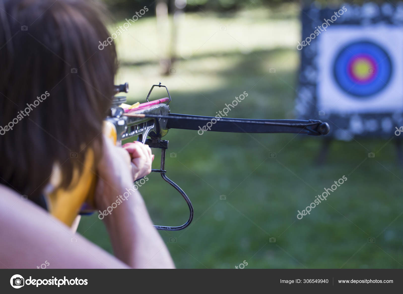 Archer with crossbow arbalest with arrows ready for hitting target in ...