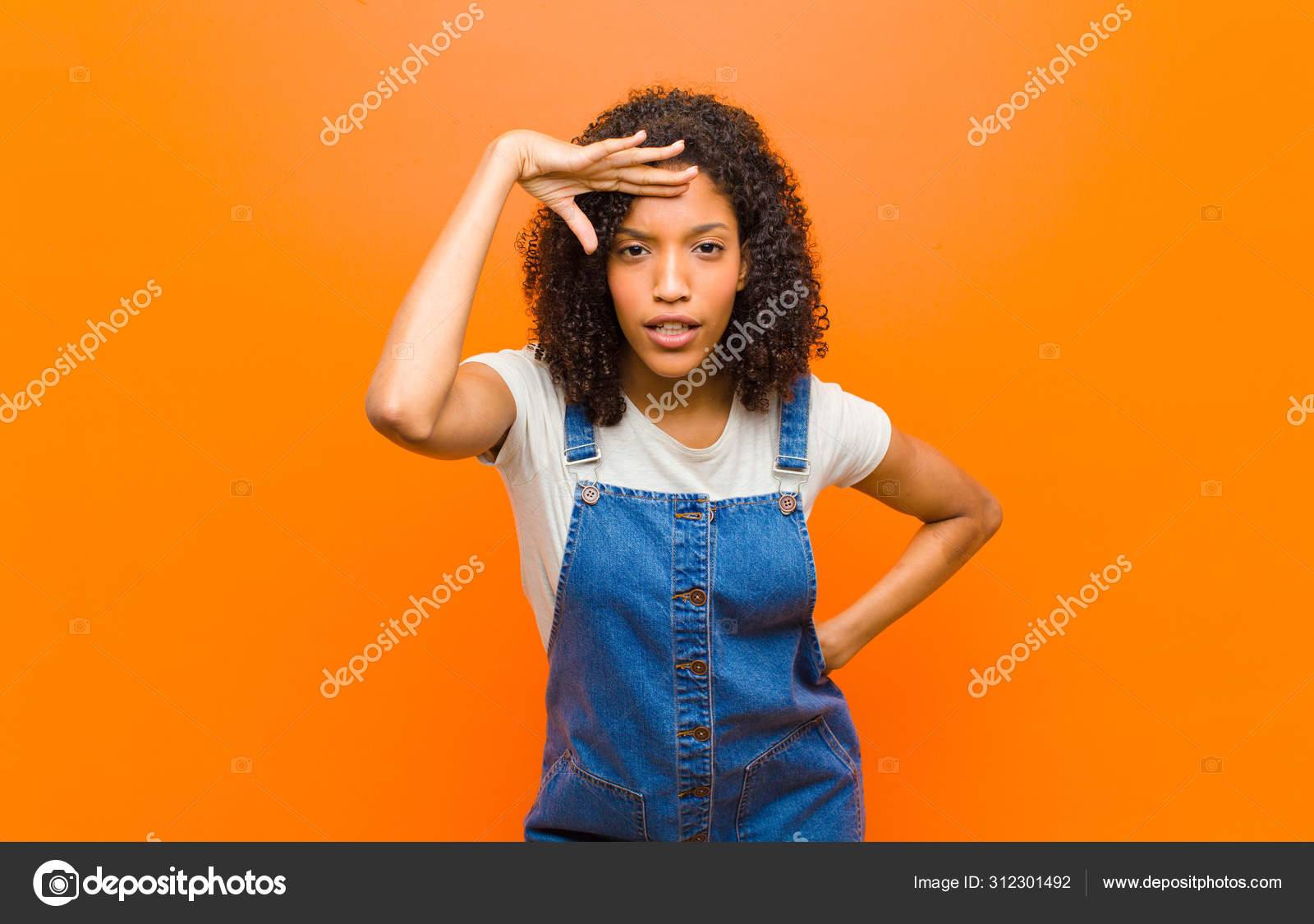 Hand On Forehead Looking