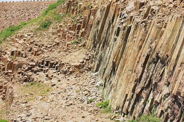 Bent hexagonal columns of volcanic origin at the Hong Kong Global ...