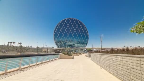 Circular skyscraper Aldar Headquarters Building timelapse hyperlapse in ...