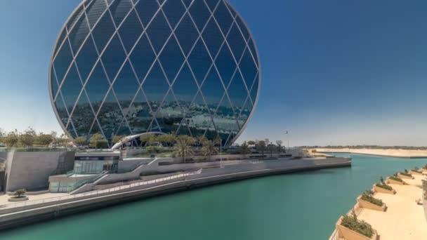 Circular skyscraper Aldar Headquarters Building timelapse hyperlapse in ...