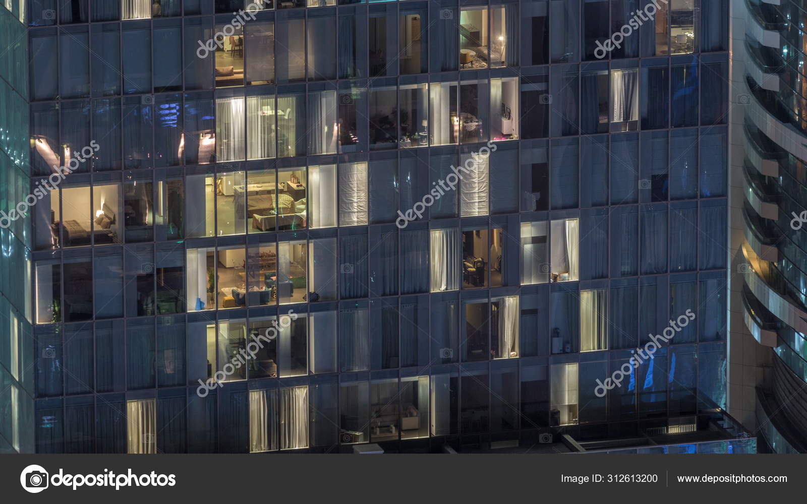 Night view of exterior apartment tower timelapse. High rise skyscraper ...