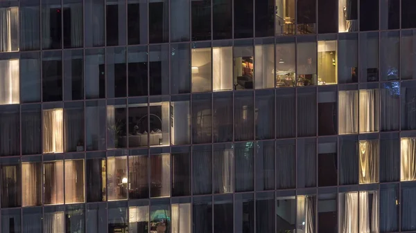 Night view of exterior apartment building timelapse. High rise ...