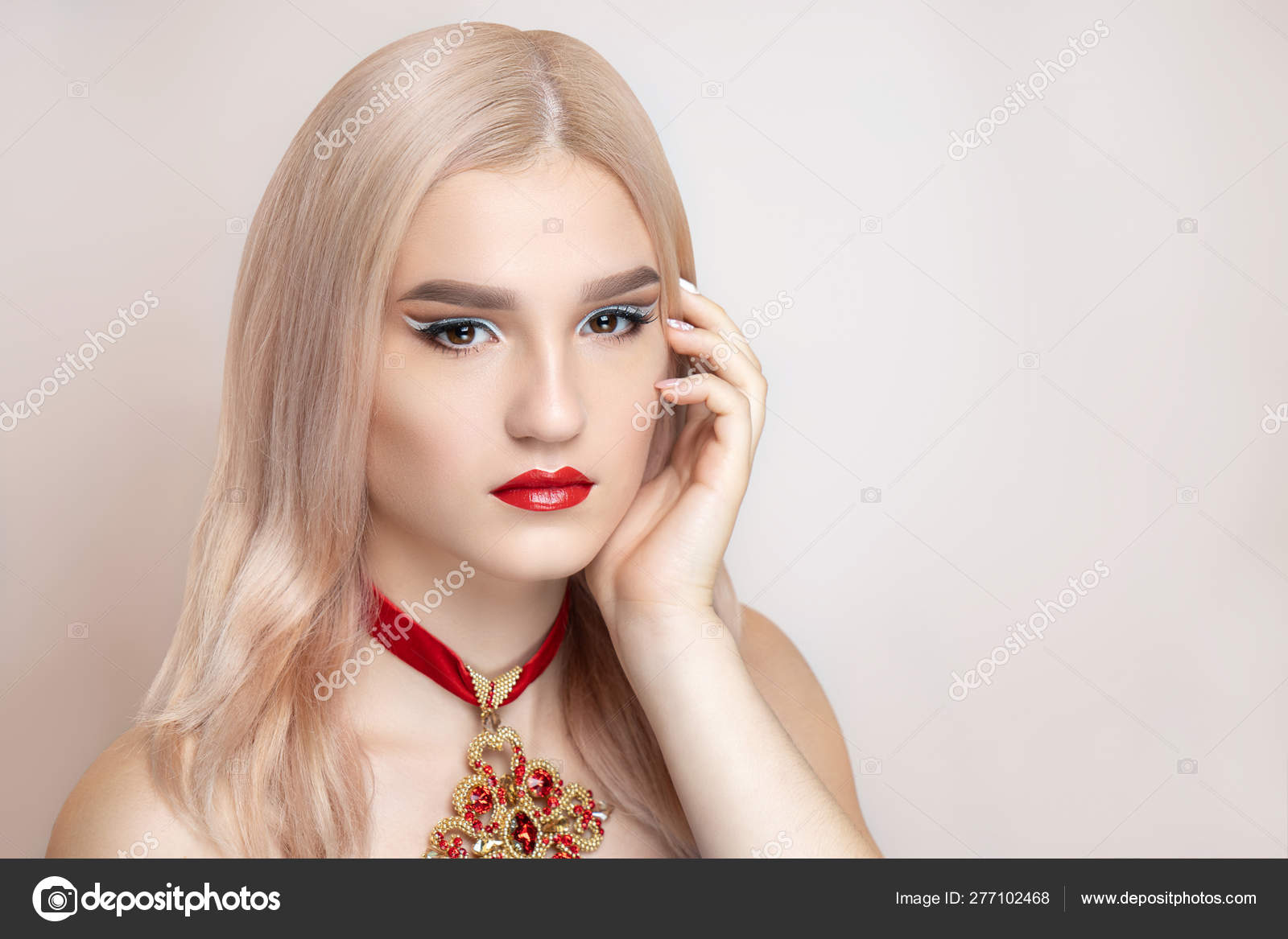 Woman touch face, massive golden cross accessory necklace — Stock Photo ...
