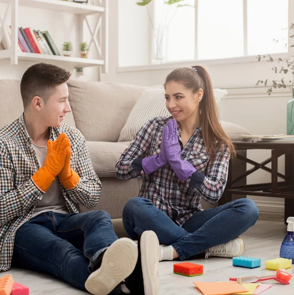 Couple cleaning at home together - Stock Image - Everypixel