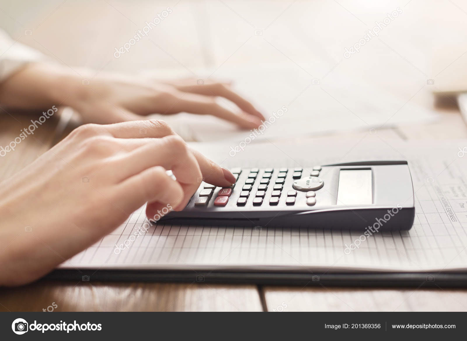 Woman using calculator with checking finance at home — Stock Photo ...