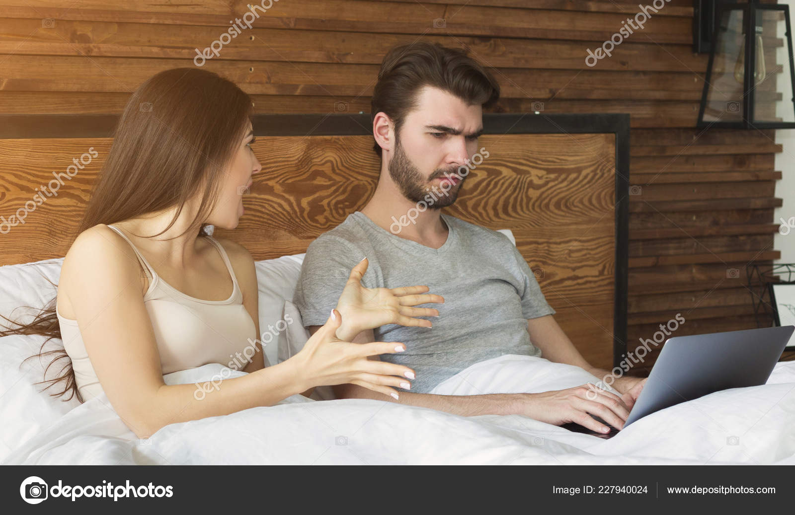 Woman arguing with man, addicted to internet — Stock Photo © Milkos ...