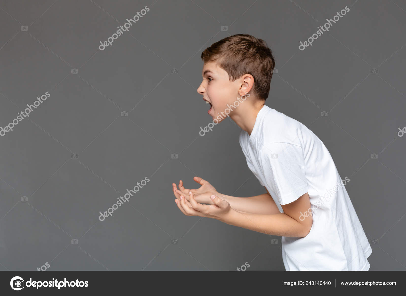 Angry boy screaming and gesturing with hands in air — Stock Photo ...