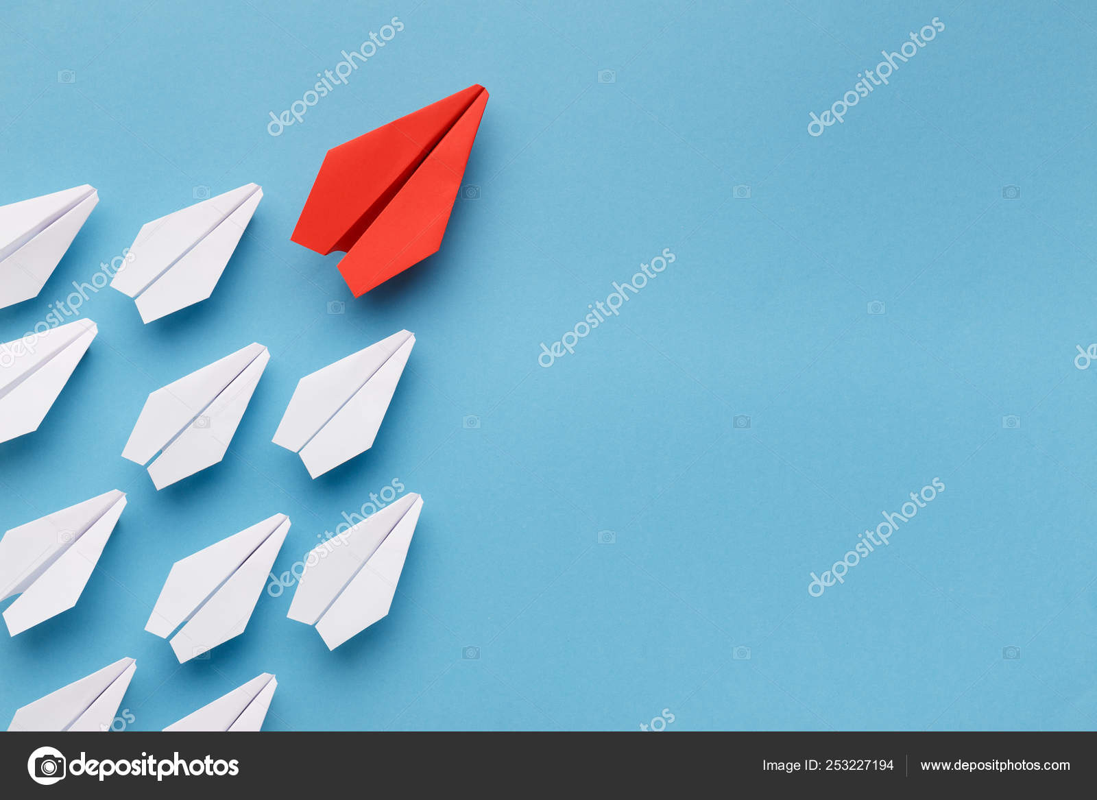 Blue paper boat leading among white ships — Stock Photo © Milkos #253227194