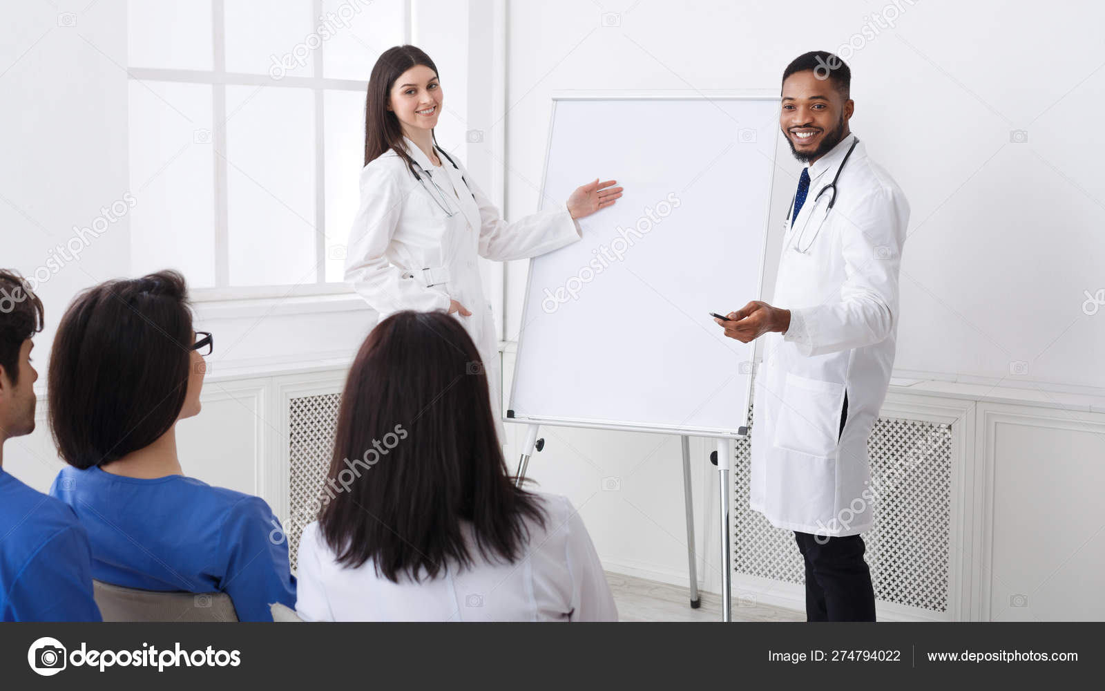 Sharing Experience. Doctors Giving Lecture To Interns — Stock Photo ...
