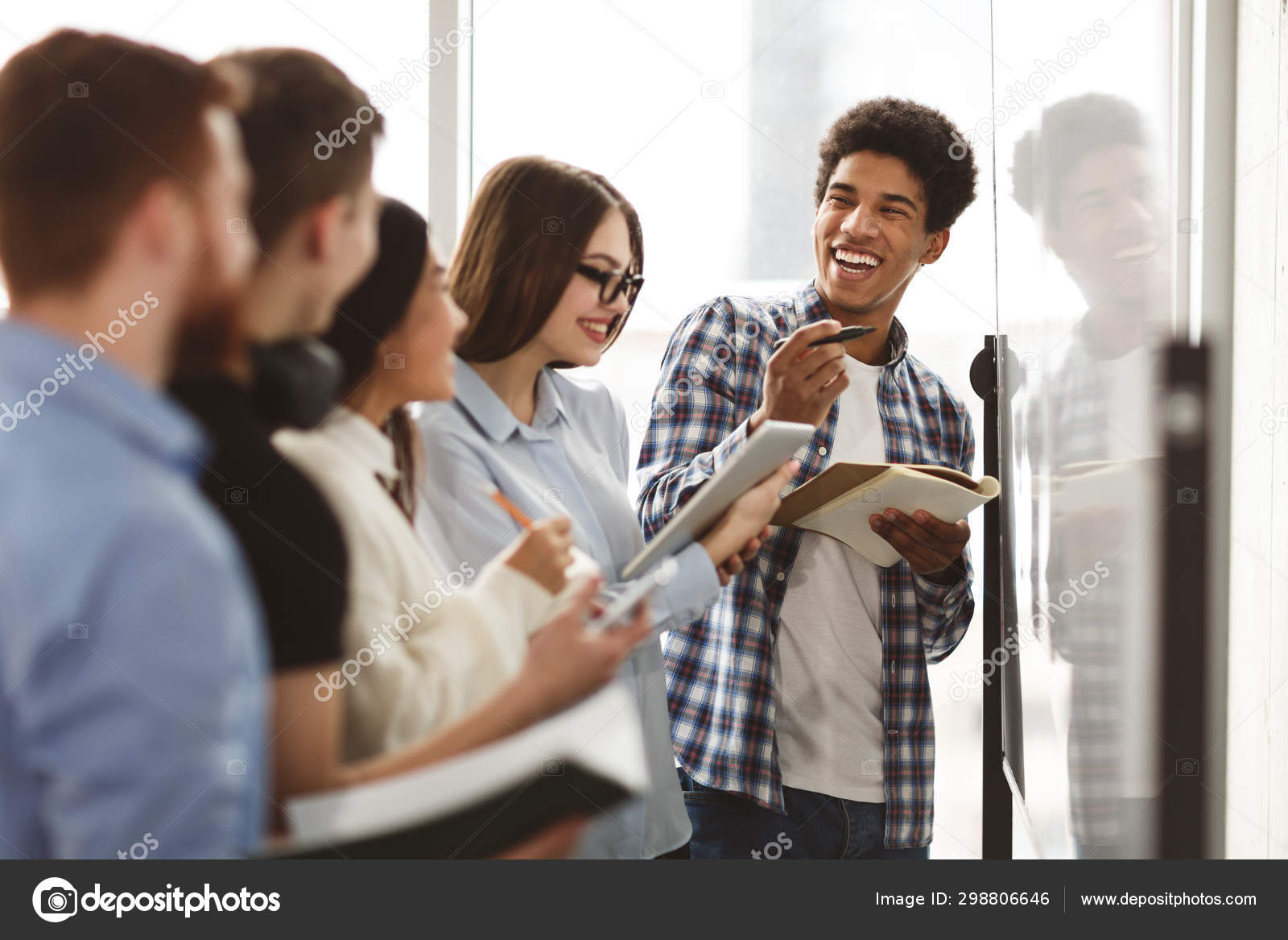 Students writing tasks on whiteboard in class — Stock Photo © Milkos ...