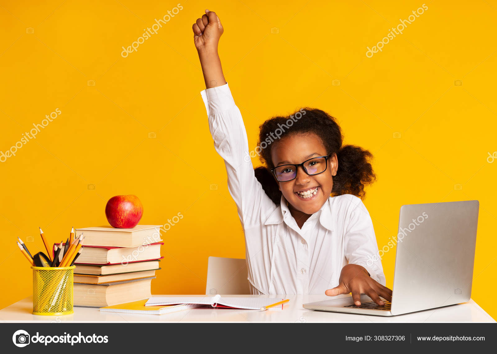 Elementary Student Girl Raising Hand Sitting At Laptop, Studio Shot ...