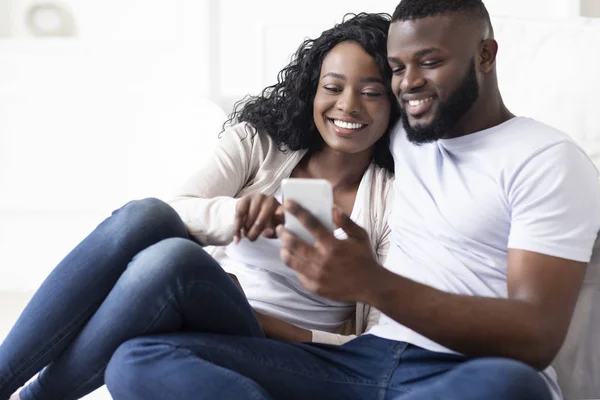 Black Couple Shopping Online On Smartphone Holding Credit Card Indoor ...