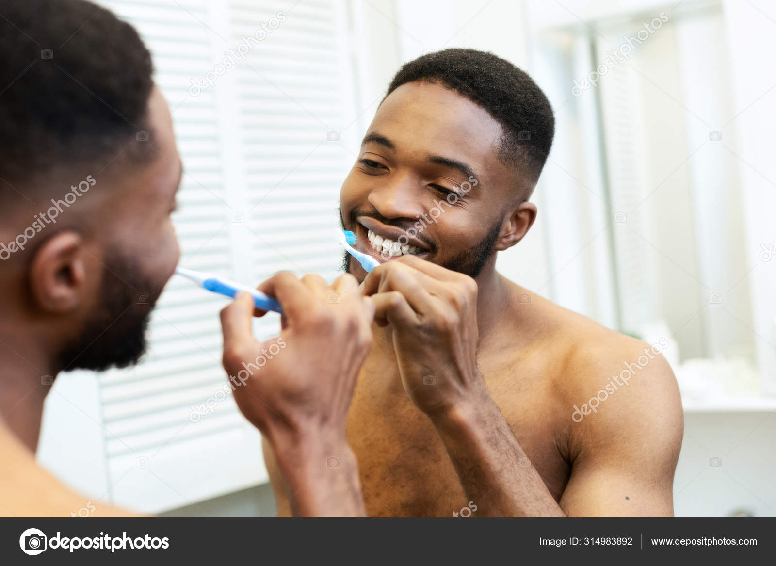 Black Man Brushing Teeth
