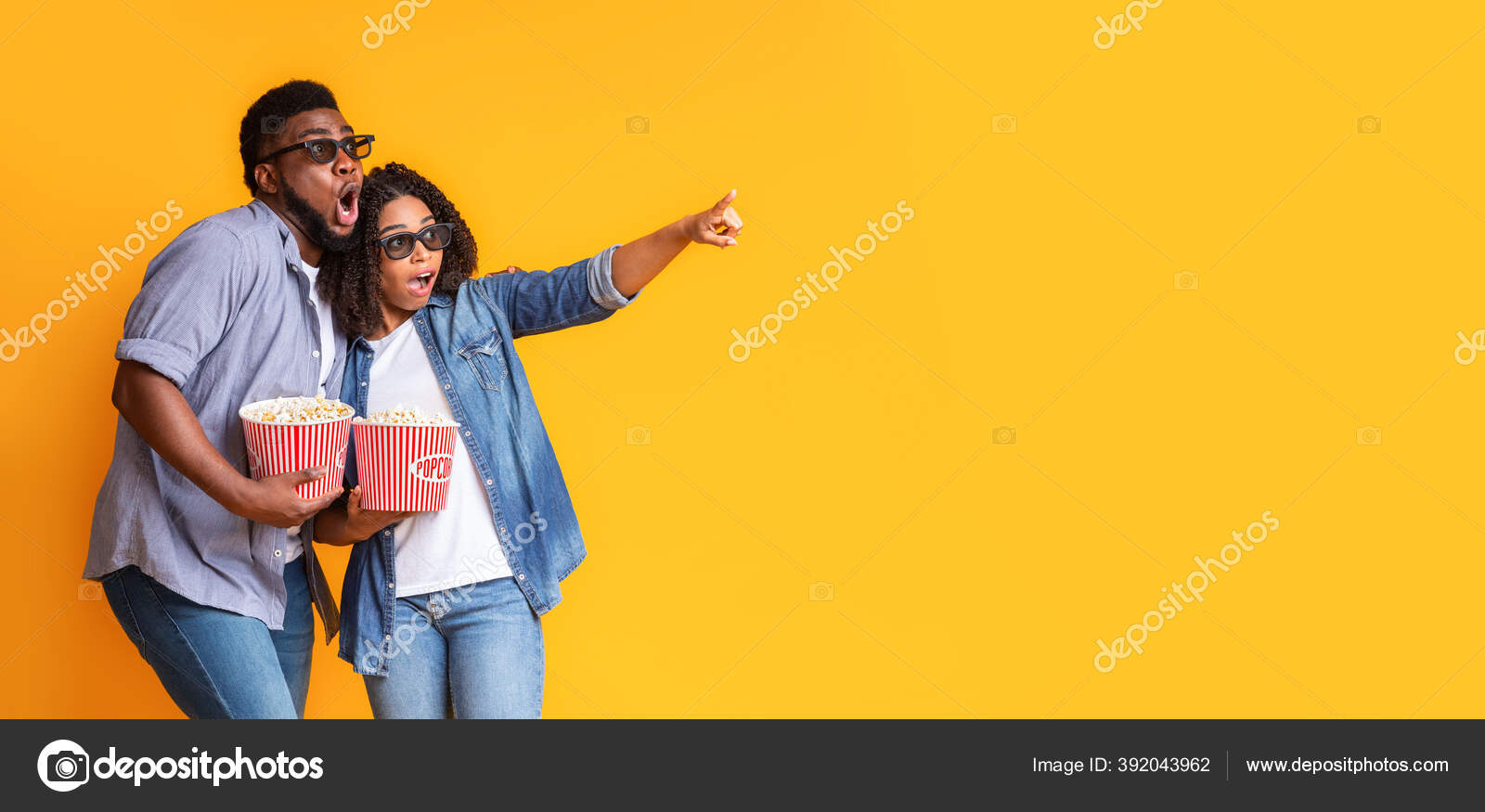 Shocking Offer. Amazed Black Couple With Popcorn Buckets Pointing At ...