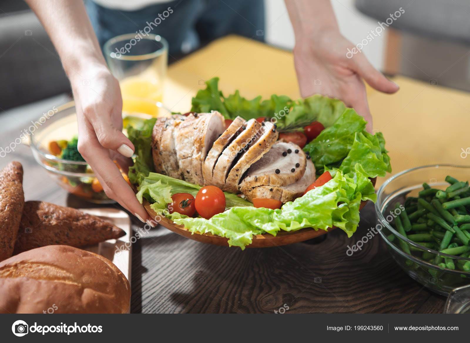Woman serving the table by appetite food Stock Photo by ©iakovenko123 ...