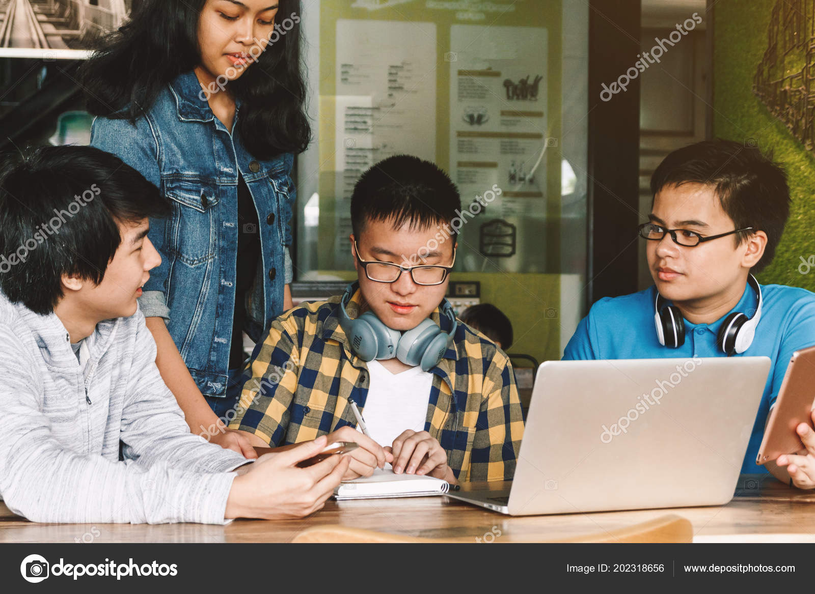 Group Teen High School Students Using Laptop Doing Homework Stock Photo ...