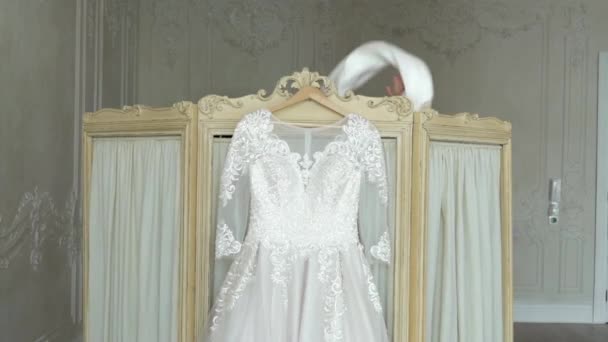 Bride undressing to put on wedding dress — Stock Video © lponline ...