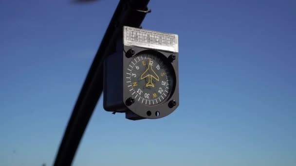 Compass in flying helicopter aircraft. Dashboard cabin view of copilot ...