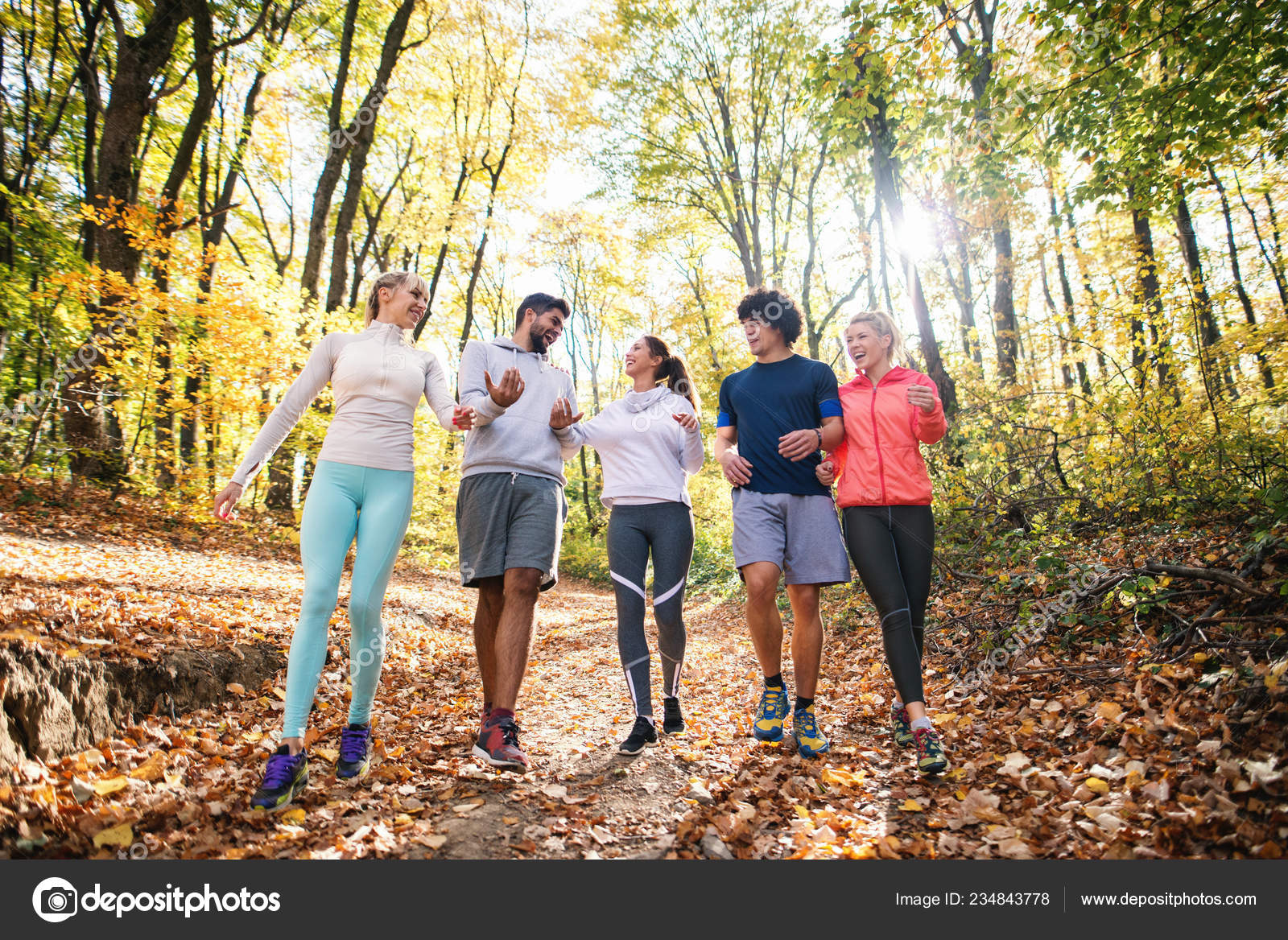 Group Runners Walking Woods Talking Autumn Season Stock Photo by ...